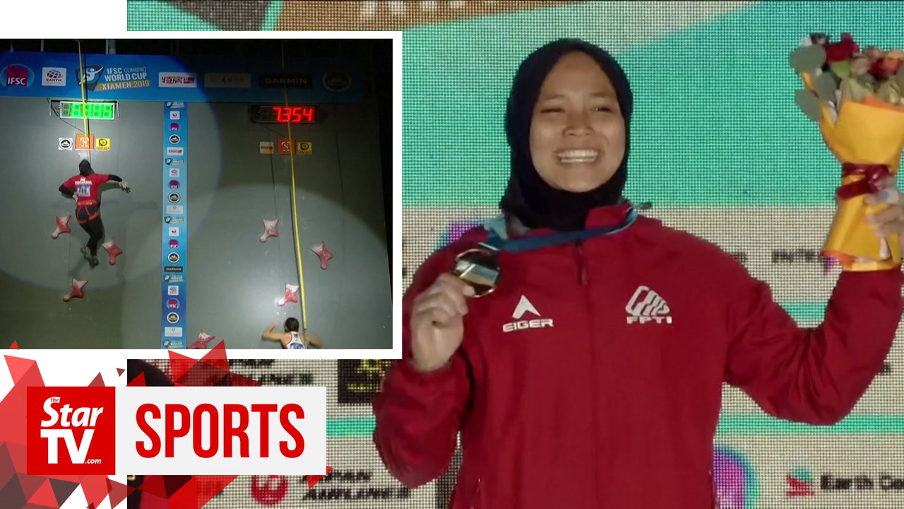 6.995 seconds: Aries Susanti sets new speed climbing world record ...