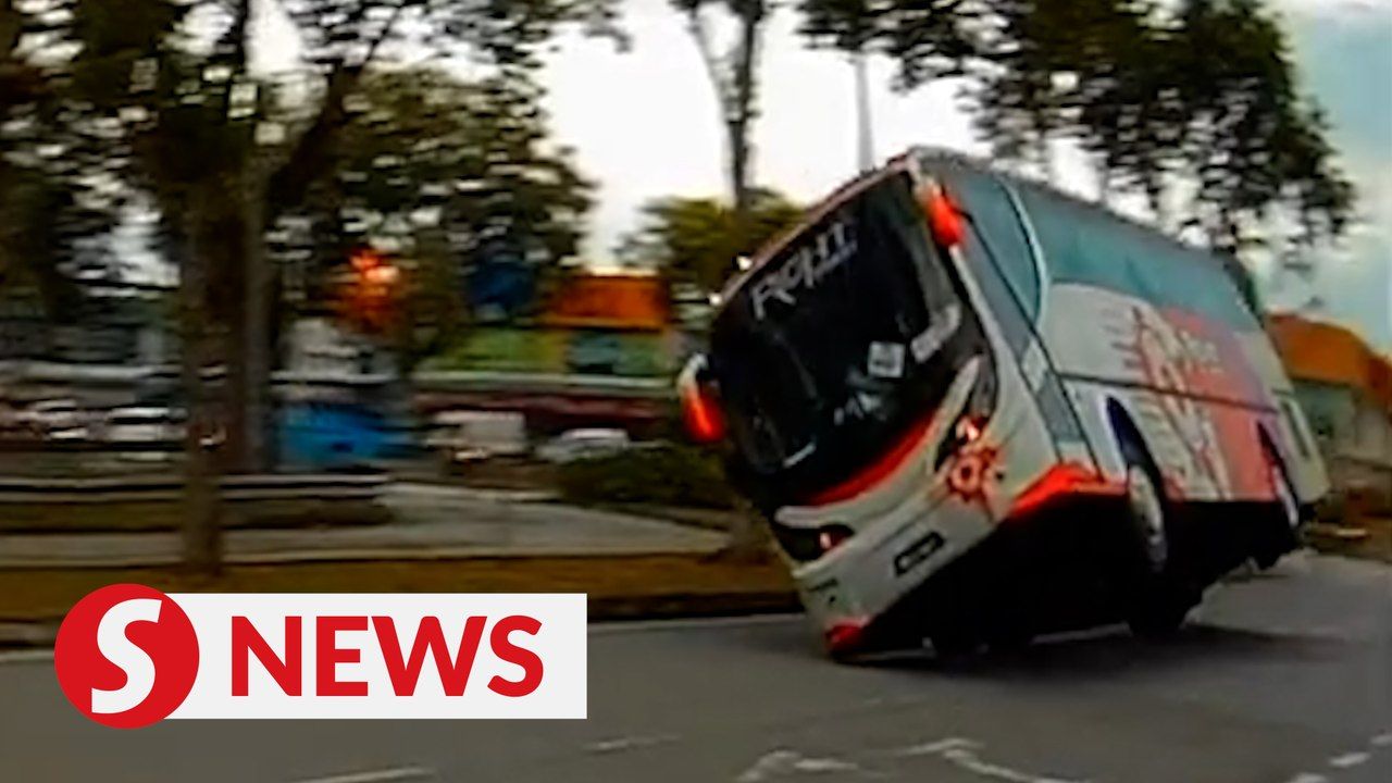 Dashcam captures moment bus skids and flips on its side in Nilai ...