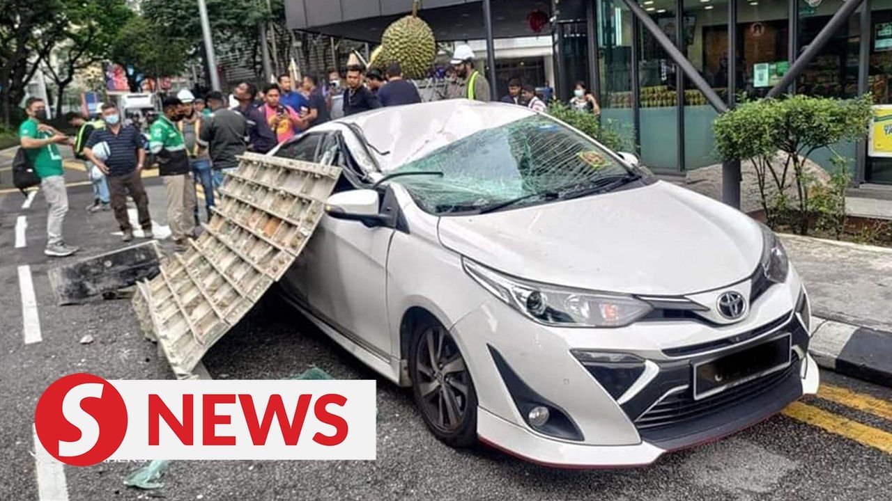 Car on Jalan Ampang damaged by falling construction material ...