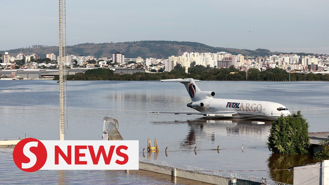 Aerial video shows submerged plane, runways flooded at Brazil airport ...