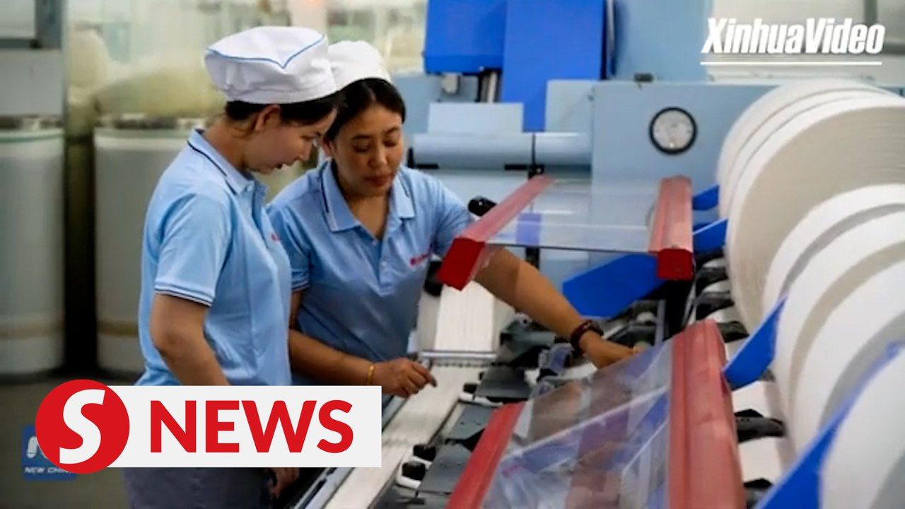 Spinning success: Xinjiang textile factory worker finds confidence ...