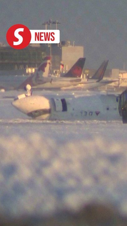 Delta plane flips upside down on landing at Toronto airport, injuring ...