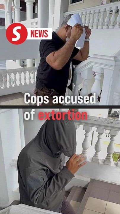 Two Penang cops claim trial to charge of extorting special officer to ...