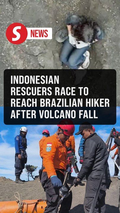 Indonesian rescuers work to reach Brazilian hiker after volcano cliff ...
