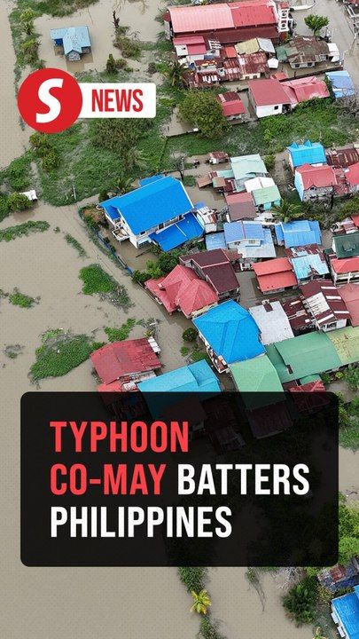 Residents evacuated from thigh-deep water as Typhoon Co-may batters ...
